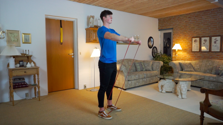 Banded Front Raise - FitnessBasen